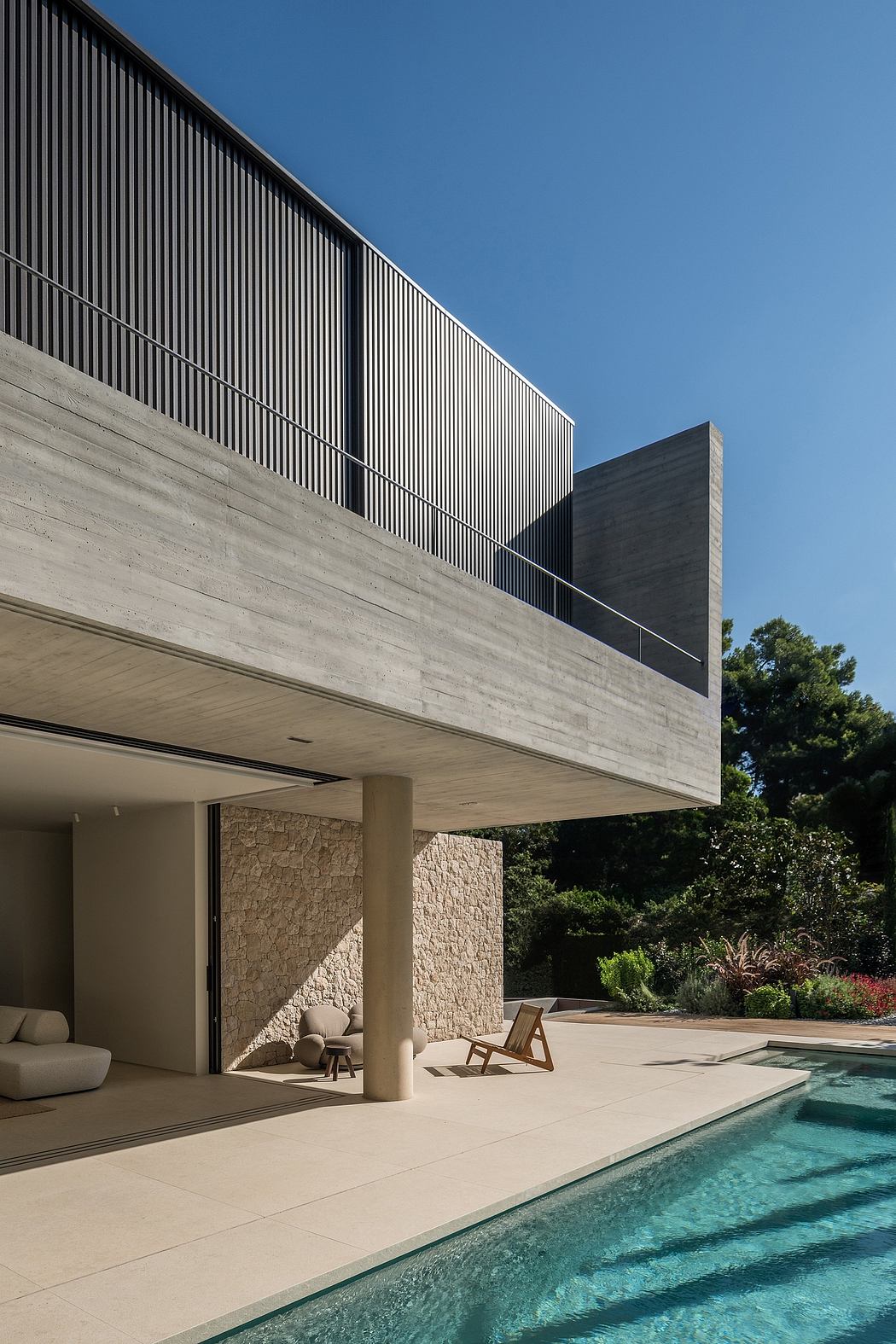Residence in Dionysos: Monolithic Concrete Dwelling Nestled in Penteli